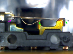 Inside the Omron D2FC-F-7N microswitch (Logitech mouse)